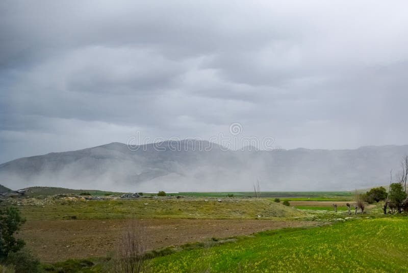 Puffs of Steam from Hot Spring Near the Mountains Stock Image - Image ...