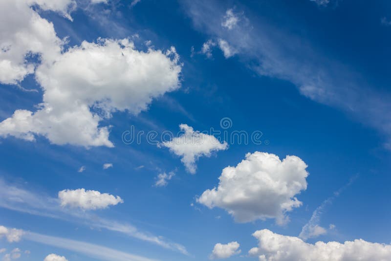 Puffy Clouds on Fresh Cheerful Blue Sky Stock Photo - Image of puffy ...