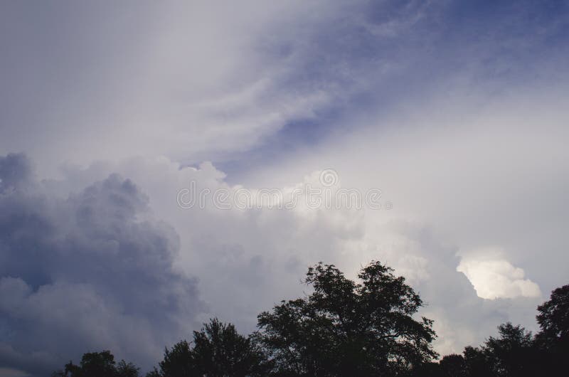Puffy White and Grey Cloud on Clear Blue Sky Stock Image - Image of ...