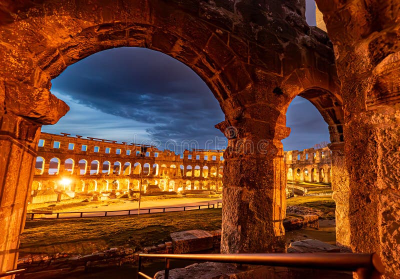 Pula arena at sunset stock image. Image of history, venetian - 372960349
