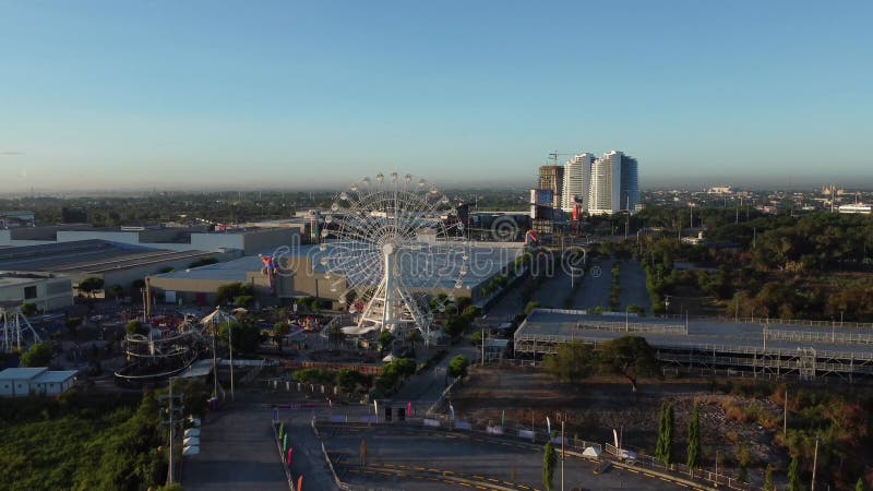 Pull-back Drone Shot of the Sky Cycle Ferris Wheel at Sky Ranch ...