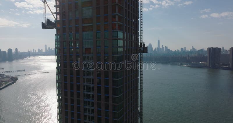 Pull Back Shot of Construction of New Modern Tall Skyscraper on ...