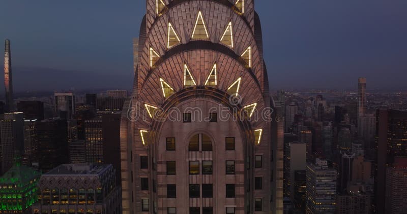 Pull Back Shot of Illuminated Decorative Crown on Top of High Rise ...