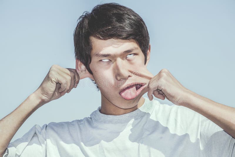 Pull the cheeks stock image. Image of eyes, hair, lips - 36030807