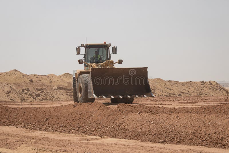Pull Dozer Making Earthwork in a Construction Site Stock Photo - Image ...
