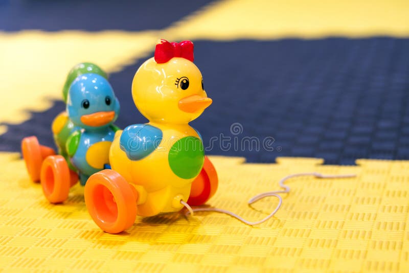 Pull Toy Duck Accompanied by Adorable Two Little Ducks on a Shelf for ...