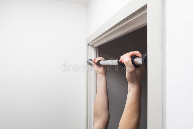Pull Up Bar in Home in a Doors Frame - Fitness at Home Stock Image ...