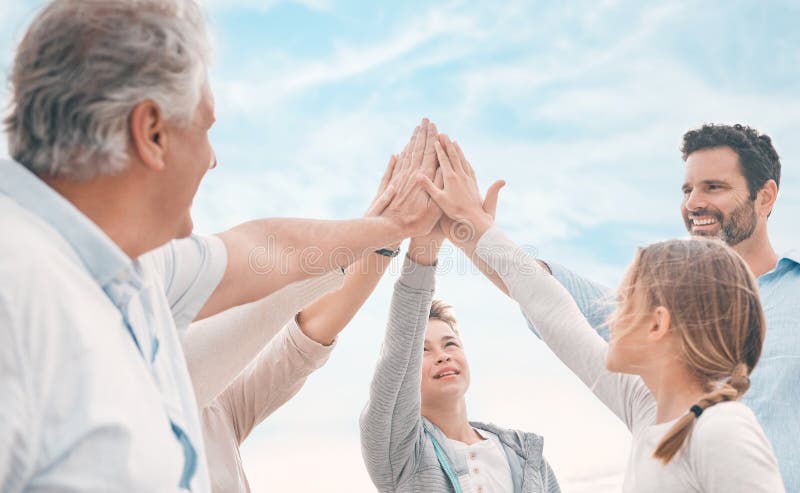Pull Up. a Beautiful Family Sharing High-five while Bonding at the ...