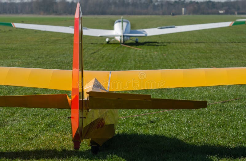 Pull Up a Glider by a Motorized Airplane Stock Photo - Image of boarder ...