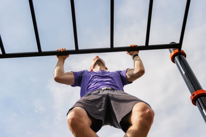 Pull-up on Outdoor Monkey Bars Under Clear Sky Stock Image - Image of ...