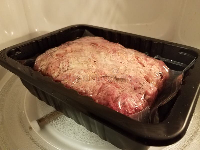 Pulled Pork Meat in Plastic Bag in Microwave Stock Image - Image of ...
