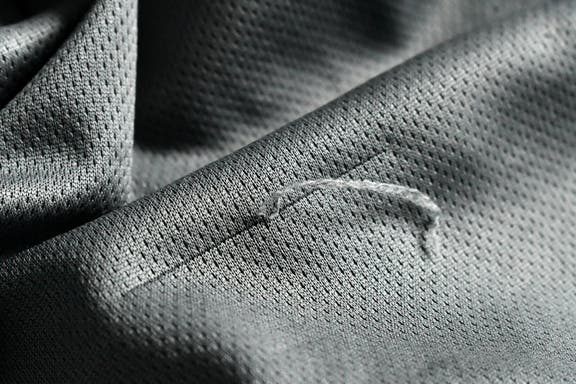 Pulled Satin Fabric. a Snag on Clothes Textile Stock Photo - Image of ...