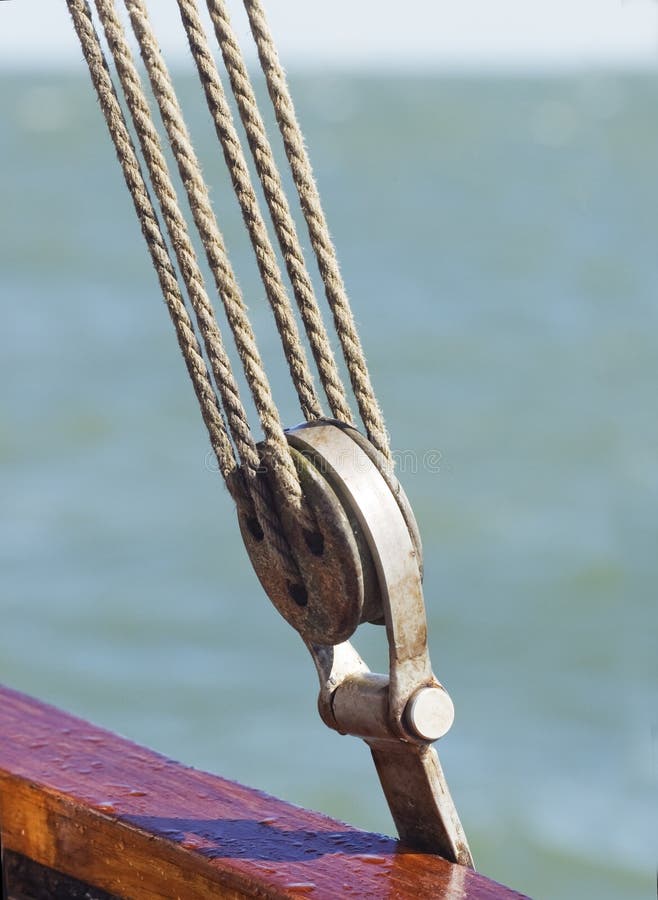 Nautical rope and pulley stock image. Image of pulley - 15103741
