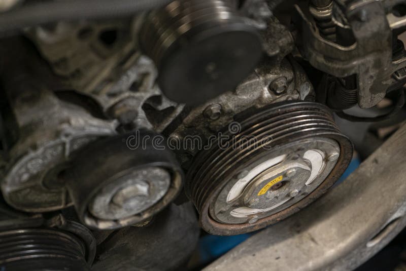 Pulley in the car engine 3 stock image. Image of diesel - 227729685
