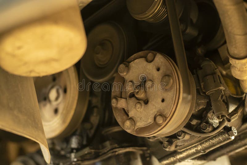 Pulleys and Belts on the Car Engine Stock Photo - Image of closeup ...