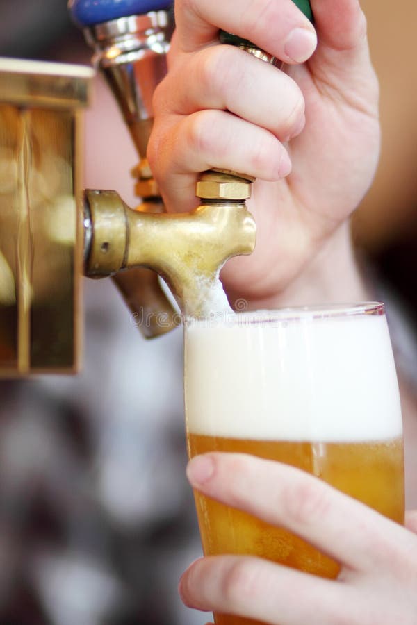 Pulling a beer tap stock image. Image of tavern, lager - 22132863