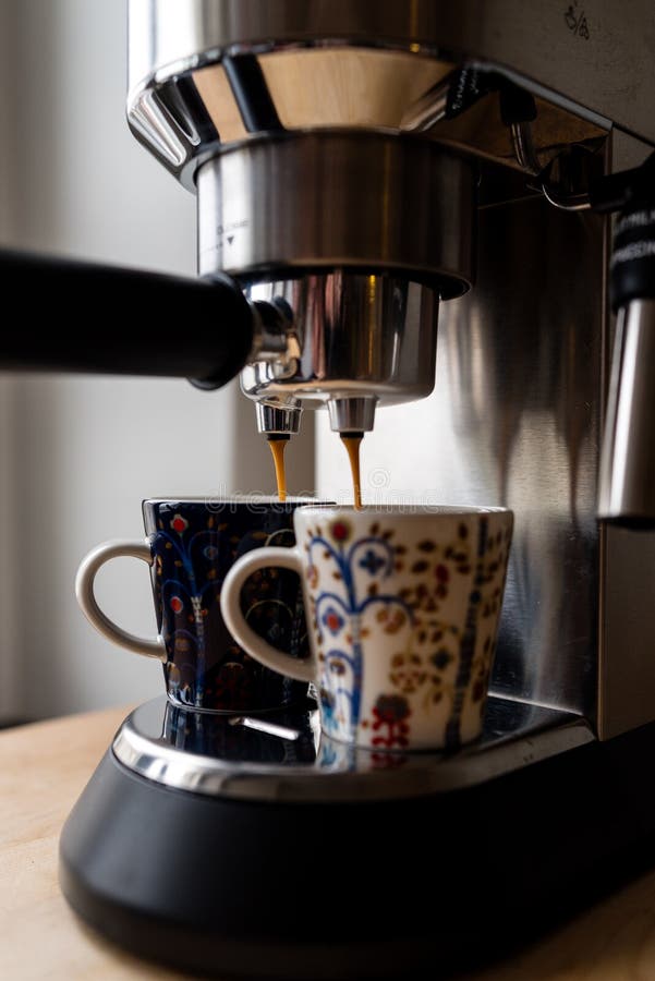 Pulling espresso shots stock image. Image of steam, cafe - 105104153