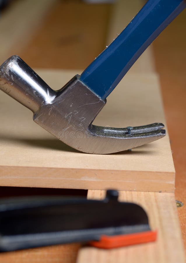 167 Hammer Pulling Nail Stock Photos - Free & Royalty-Free Stock Photos ...