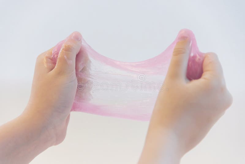 Pulling Pink Slime in Hands Stock Image - Image of modern, business ...