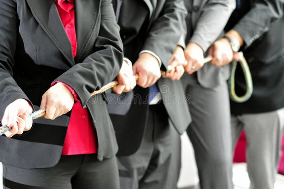 Pulling together stock image. Image of businessdress - 11969679