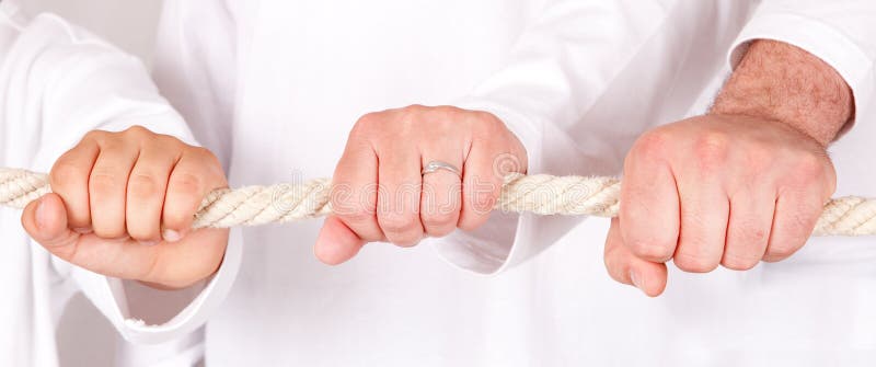 Pulling together stock image. Image of hands, hold, conceptual - 14557259