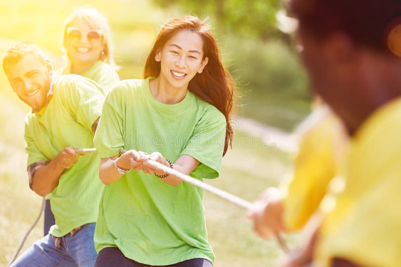 Pulling Together in a Tug-of-war Stock Photo - Image of building ...