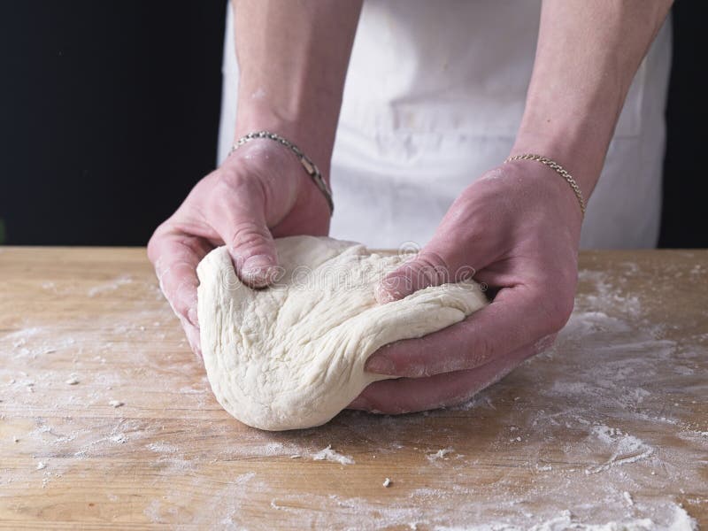 Pulling Up the Dough from the Table Stock Image - Image of ingredients ...