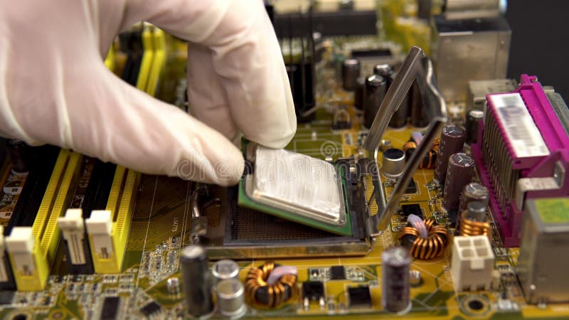 Pulls the Central Processor Out of the Motherboard. the Processing ...