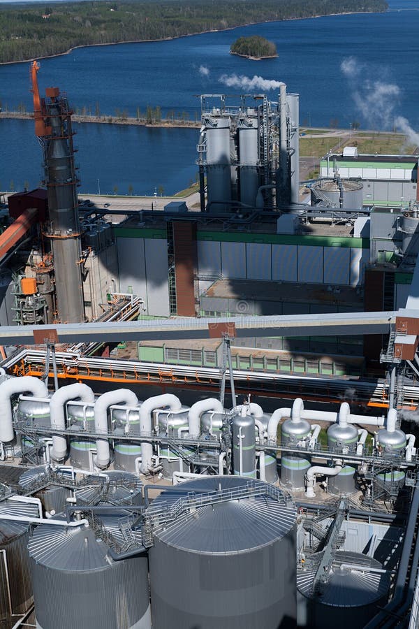 Paper Mill with Stacks of Trees To Be Processed Stock Image - Image of ...