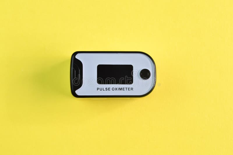 Pulse Oximeter Isolated on a Yellow Background Stock Image - Image of ...