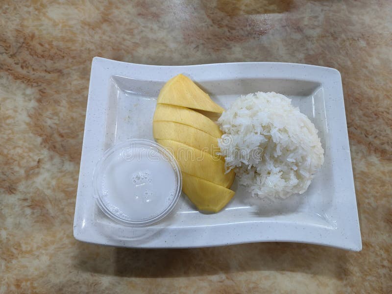 Pulut Mangga is a Famous Dessert in Malaysia Stock Photo - Image of ...