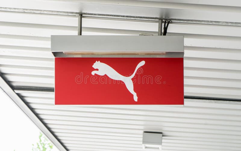The Puma Logo on the Ceiling in Front of a Store in an Outlet in ...