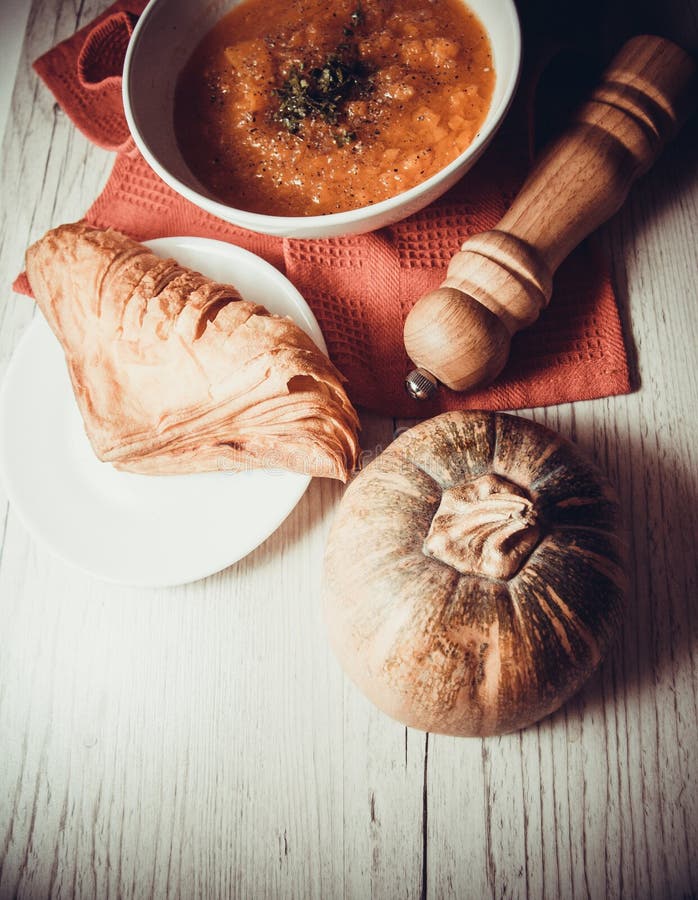 Pumkin soup with puff bun stock photo. Image of food - 63599982