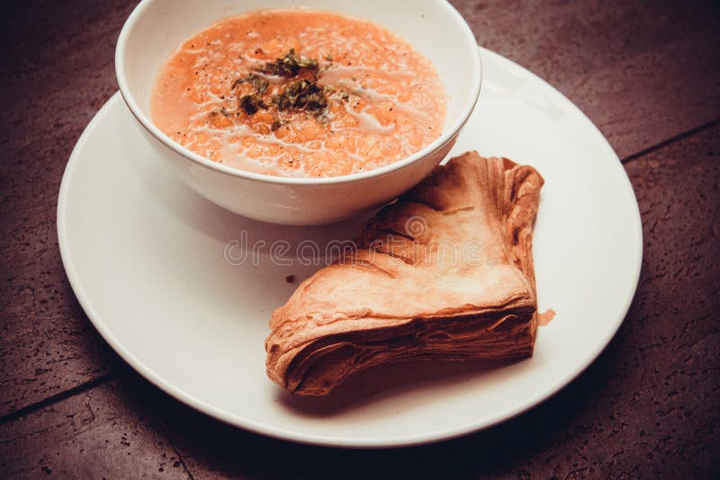 Pumkin soup with puff bun stock photo. Image of piece - 65187516