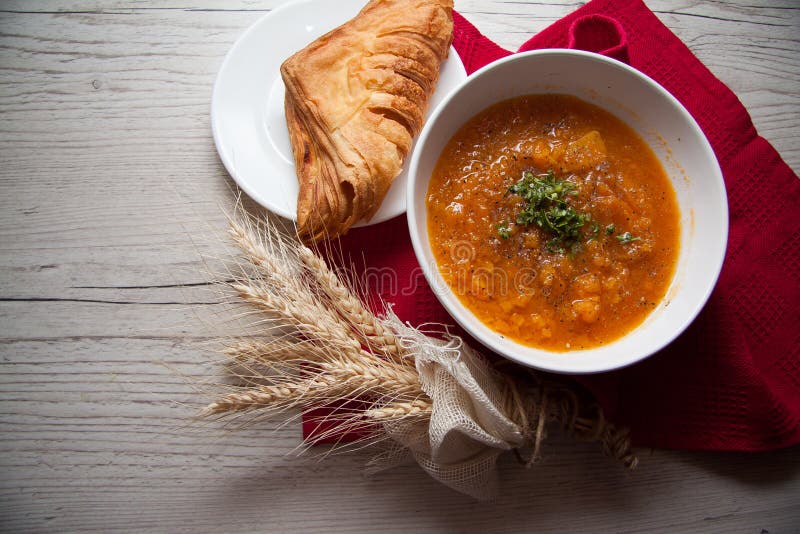 Pumkin soup with puff bun stock image. Image of october - 65207511