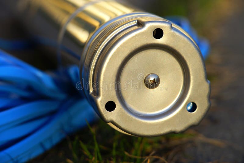 Pump Bottom with Cable Closeup. Electric Pump with a Blue Cable Stock ...