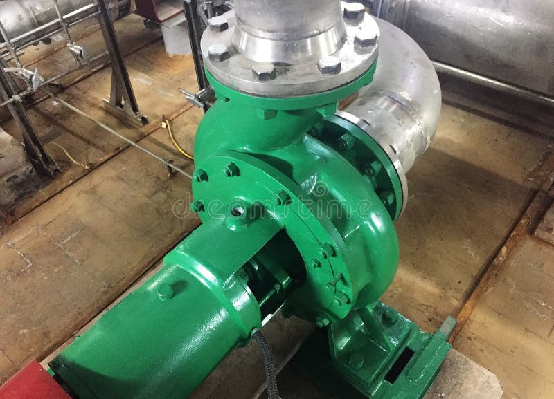 Pump and Engine at an Industrial Facility. Caution the Equipment in ...