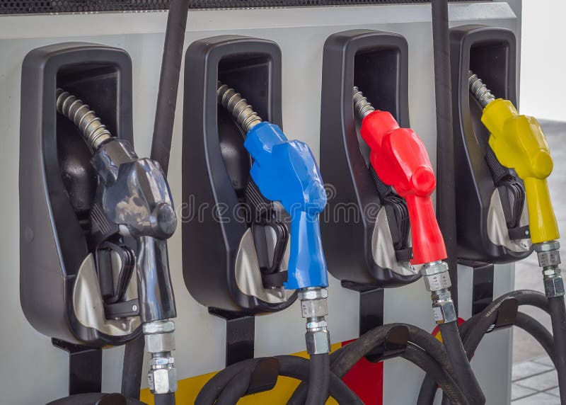 Pump Nozzles At The Gas Station Stock Photo - Image of energy, fuel ... Pump Nozzles At The Gas Station Stock Photo - Image of energy, fuel ...