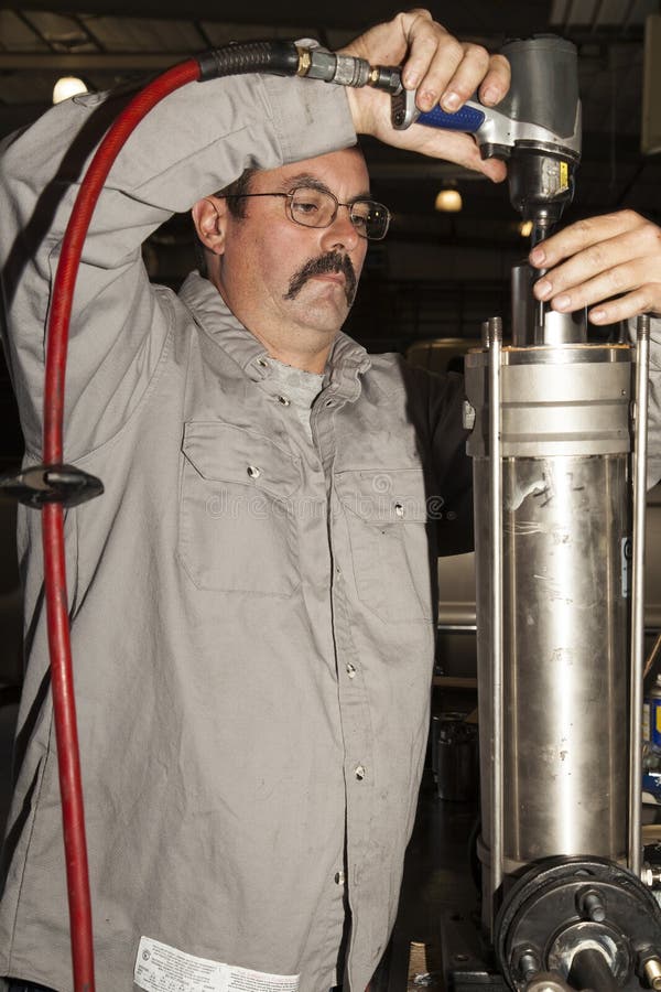 Pump Repair stock photo. Image of steel, pump, wrench - 26377592