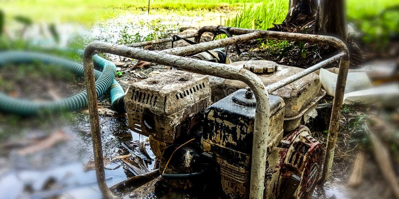 Pumping Machine To Drain Water into the Fields Stock Photo - Image of ...