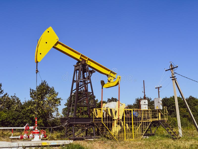 Pumping Unit As the Oil Pump Installed on a Well Stock Image - Image of ...