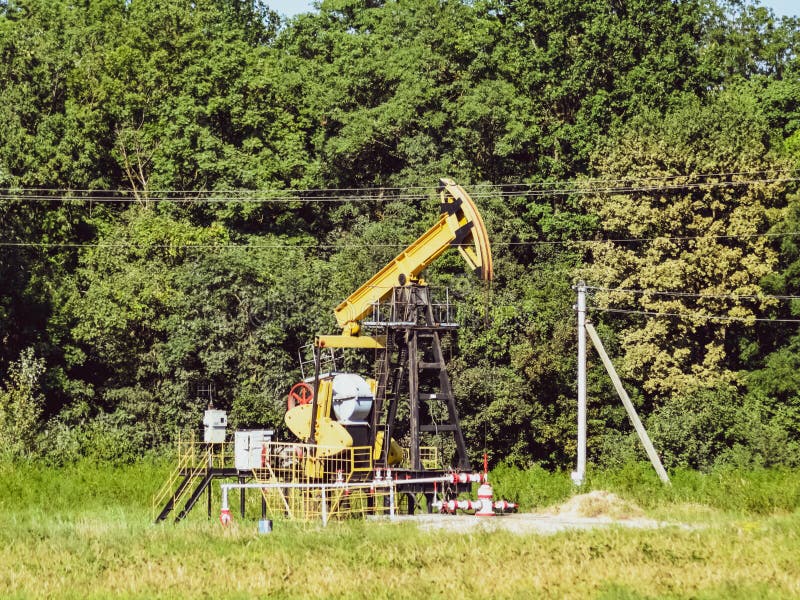 Pumping Unit As the Oil Pump Installed on a Well Stock Photo - Image of ...