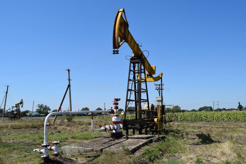 Pumping Unit As the Oil Pump Installed on a Well Stock Image - Image of ...