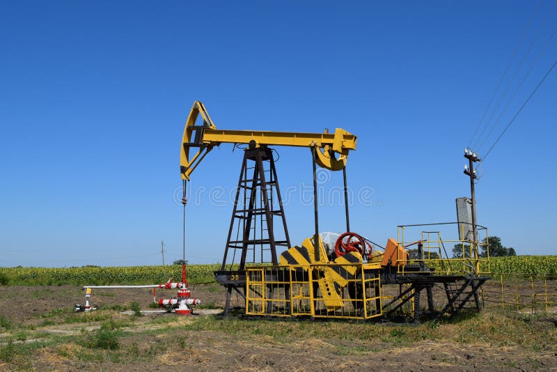 Pumping Unit As the Oil Pump Installed on a Well Stock Image - Image of ...