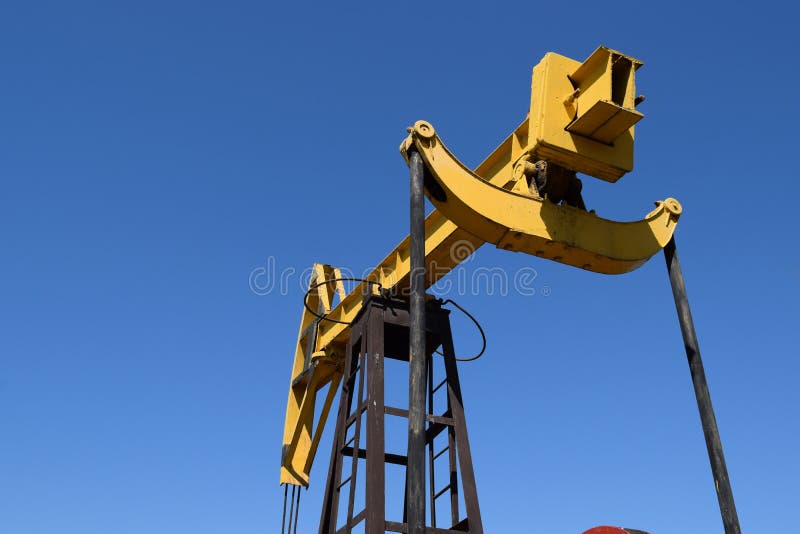 Pumping Unit As the Oil Pump Installed on a Well Stock Image - Image of ...