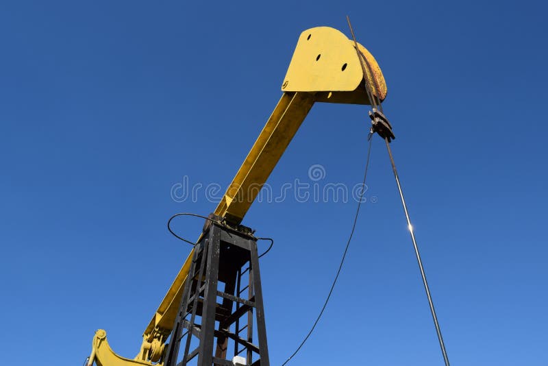 Pumping Unit As the Oil Pump Installed on a Well Stock Image - Image of ...
