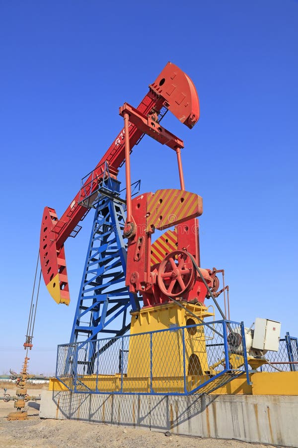 Pumping Unit Under Blue Sky Stock Photo - Image of production, reserves ...