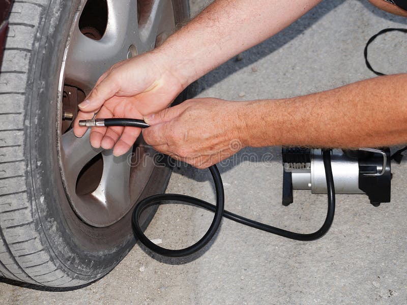Pumping Up a Car Wheel with a Pump Close-up Stock Image - Image of ...