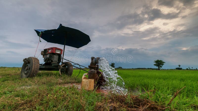 Pumping water stock image. Image of industry, field, machine - 87778291