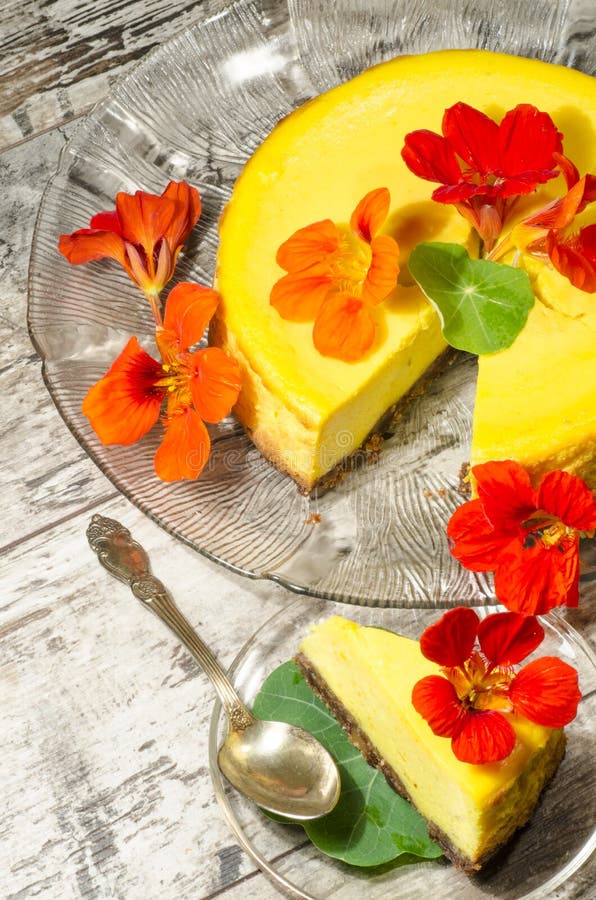 Pumpkin Cheesecake Decorated with Fresh Flowers. Vertical Format Stock ...